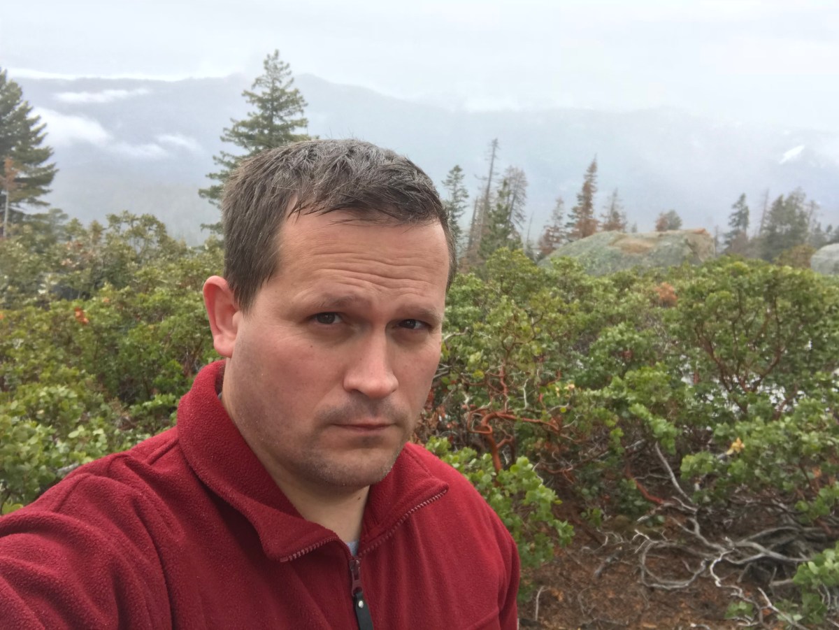 About – Through A Glass Darkly